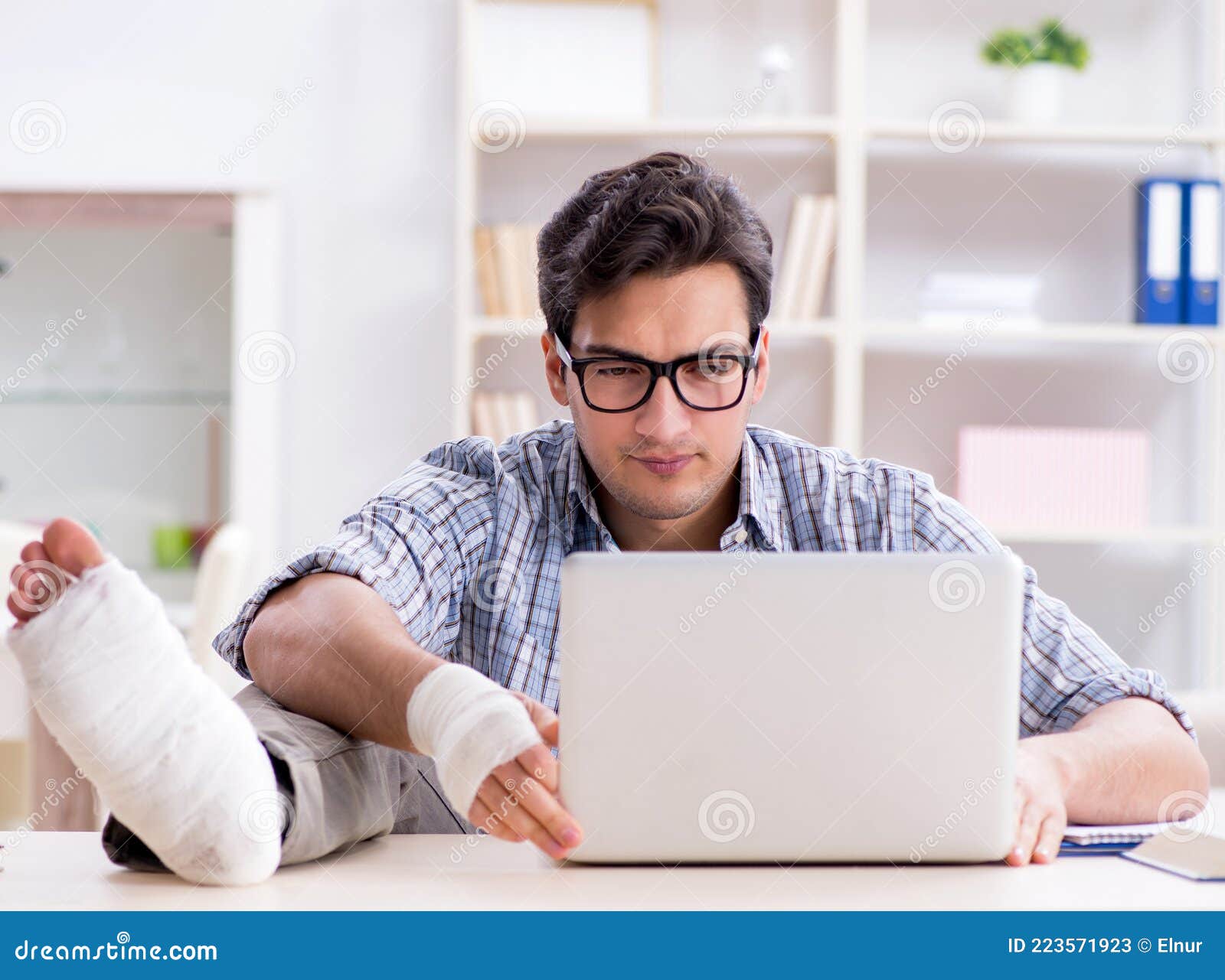 Freelancer with Foot Injury Working from Home Stock Image - Image of ...