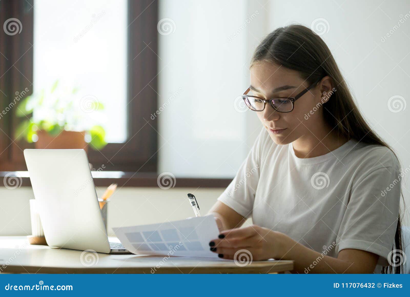 Freelancer Working at Laptop Writing Down Information Stock Photo ...