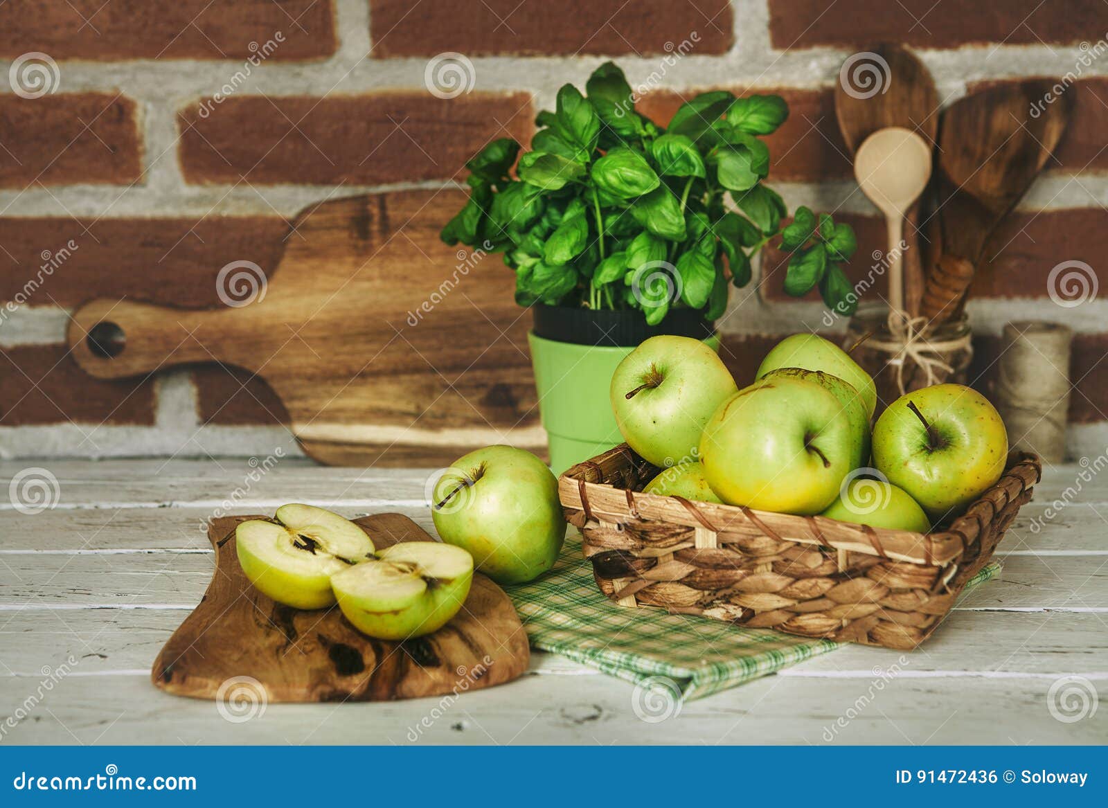 Freesh Green Apples and Basil with Wooden Kitchen Props Stock Photo ...