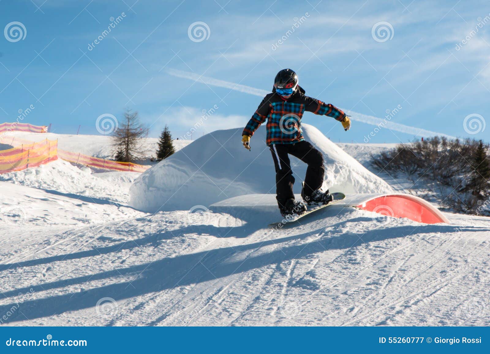 Freestyle Snowboarder with Helmet in Snowpark Stock Image - Image of ...