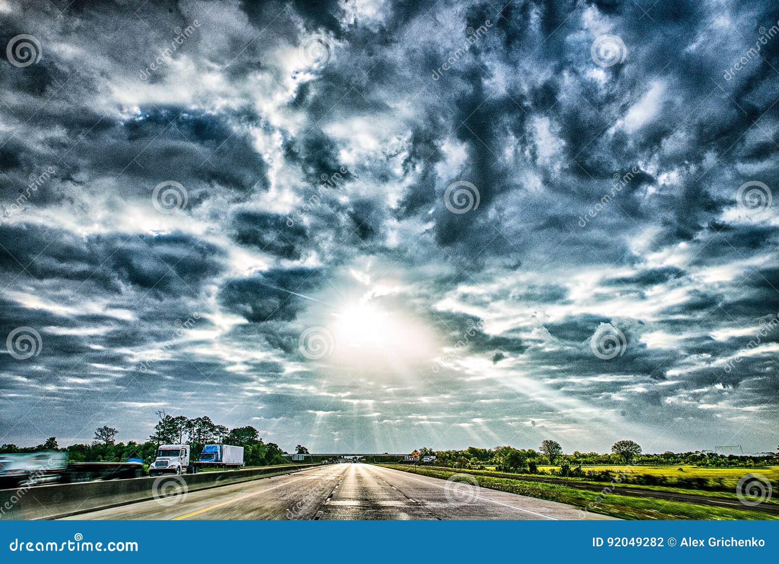 Freeway through Country Landscape with Dramatic Skyes and Sun Ra Stock ...