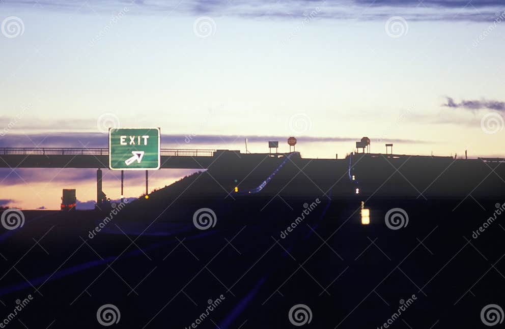 A Freeway Exit Sign at Dusk Stock Image - Image of text, freeway: 52302213