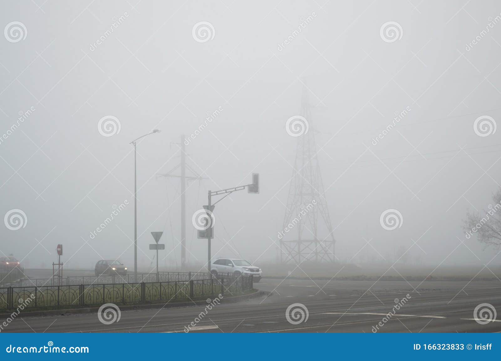 Freeway and Intersection with Traffic Lights in Dense Fog Stock Image ...