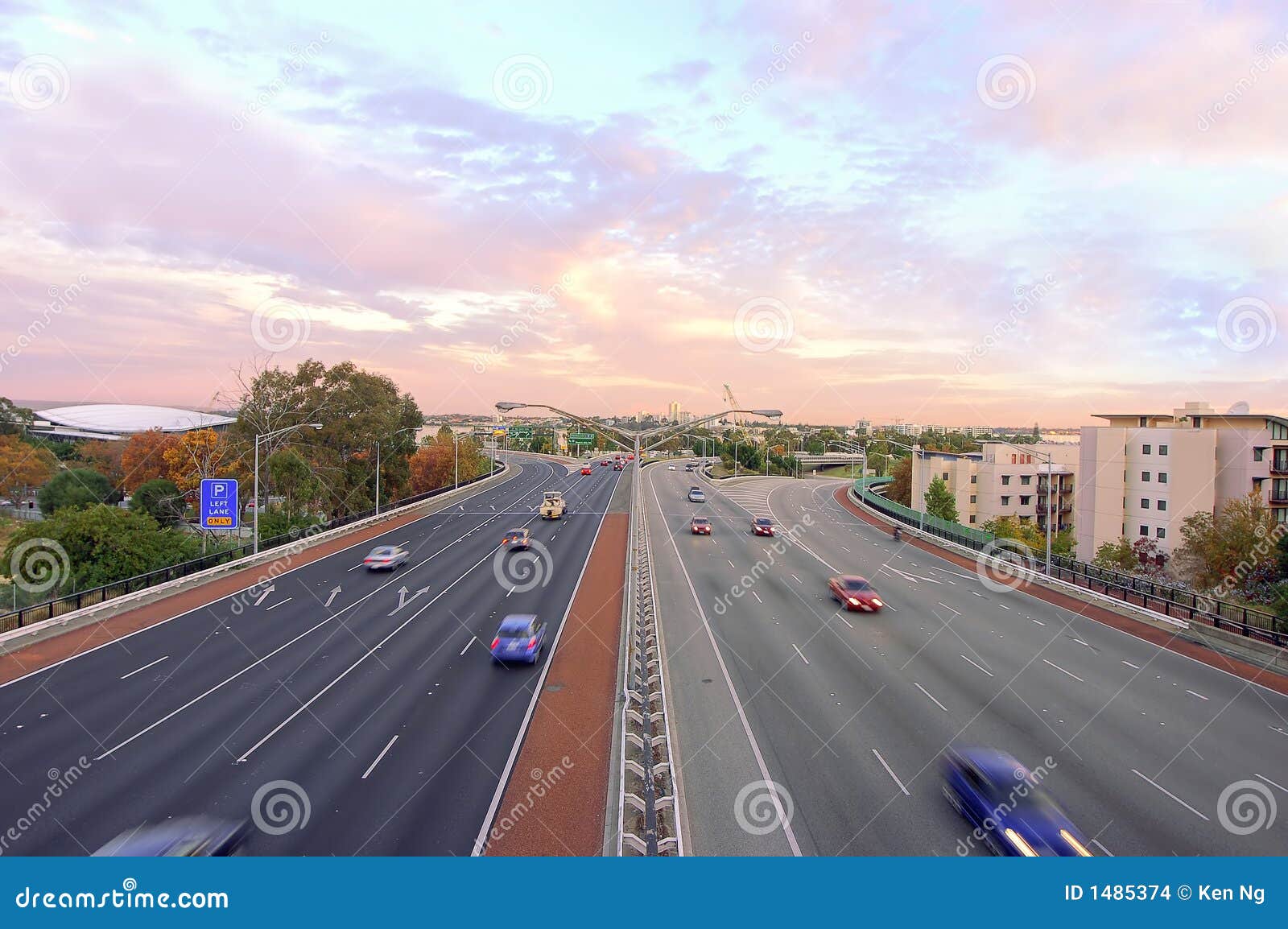 Freeway Sunset Shot with Traffic Stock Photo - Image of signs, traffic ...