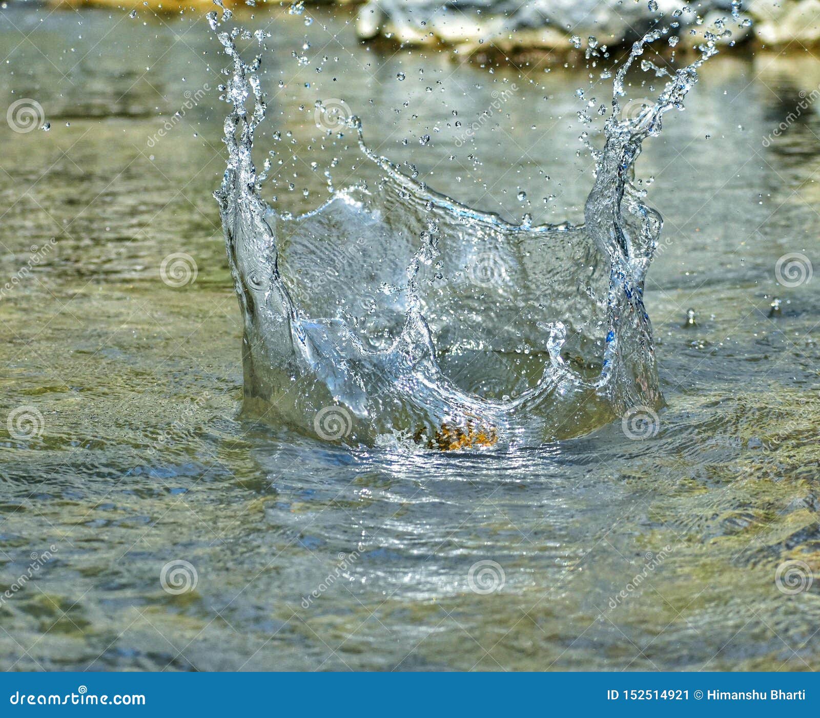 A Freez Shot Of A Stone Getting Splashed In Water Stock Image Image Of Splashed Freez 152514921