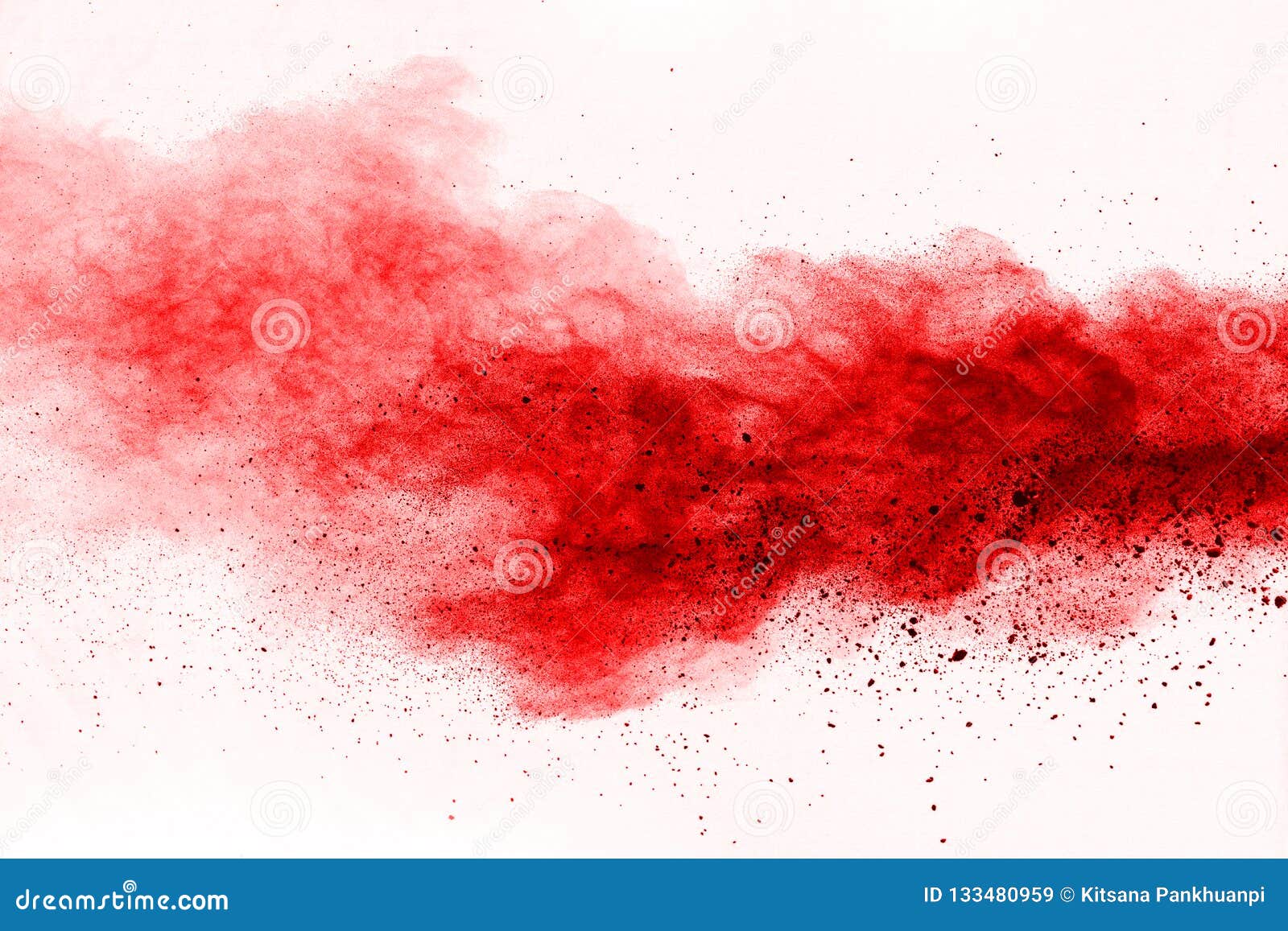 Freeze Motion of Red Powder Exploding, Isolated on White Background ...