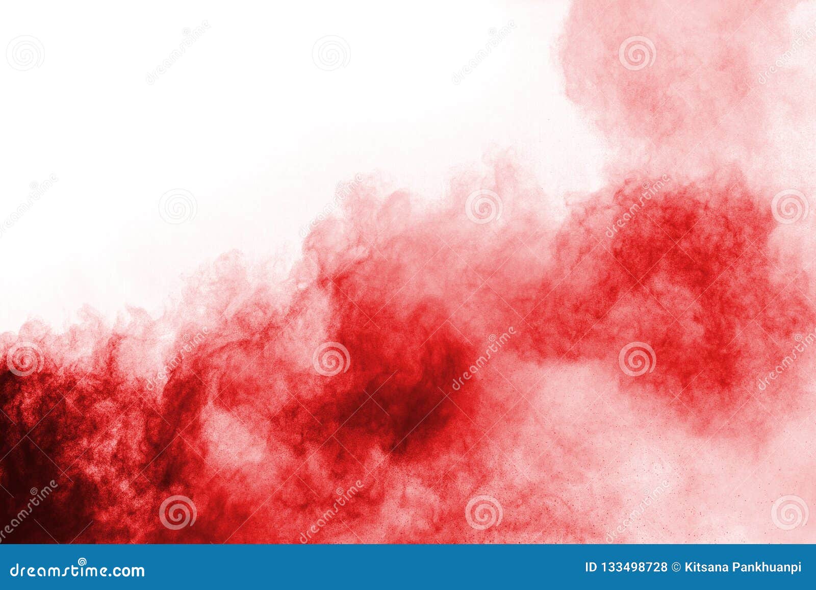 Freeze Motion of Red Powder Exploding, Isolated on White Background ...