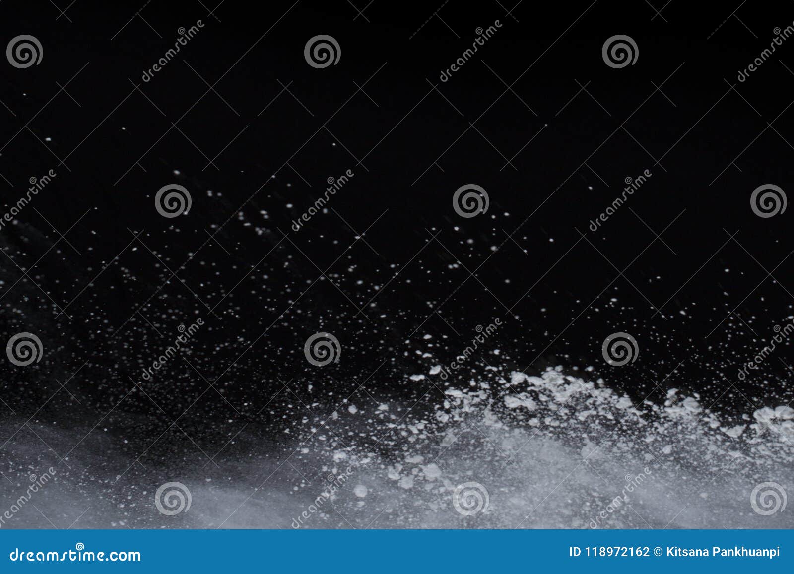 Freeze Motion of White Color Powder Exploding on Black Background ...