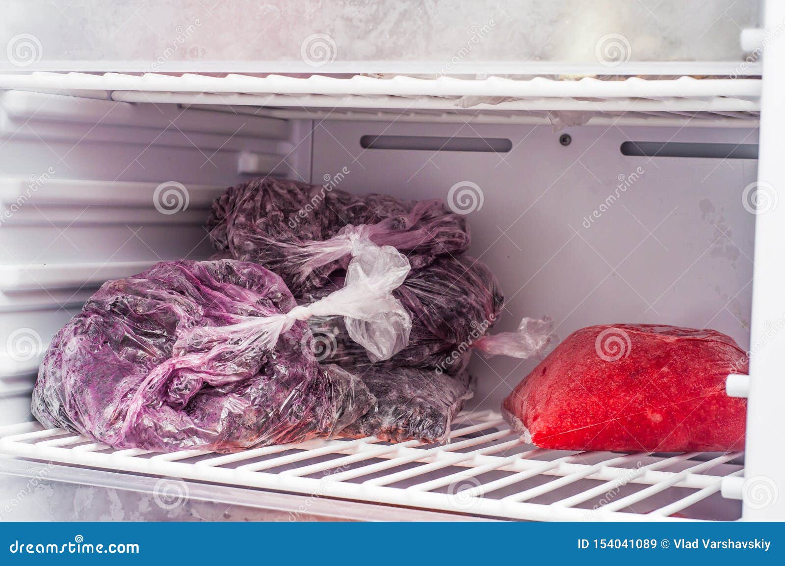 The Freezer Filled with Multi-colored Useful Products and Vitamins for ...