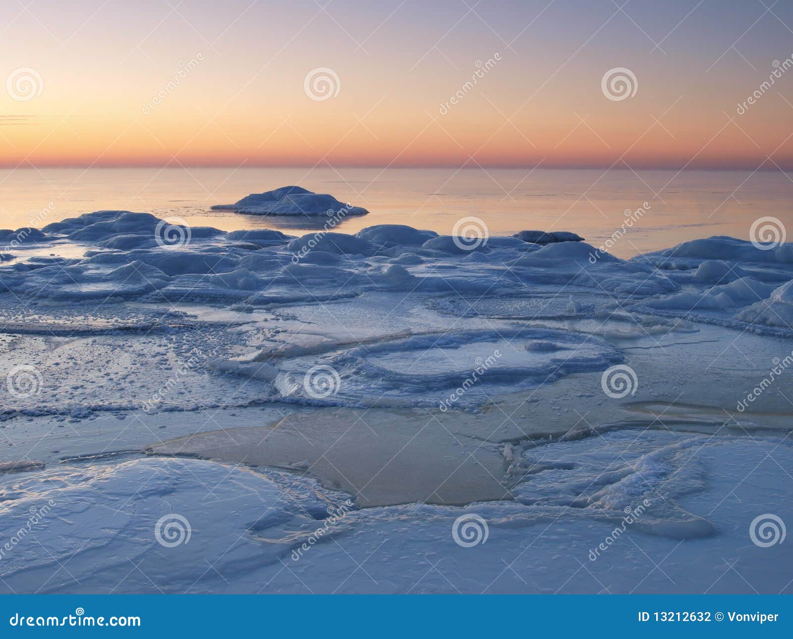Freezing Sea Shore in the Romantic Evening Light Stock Photo - Image of ...