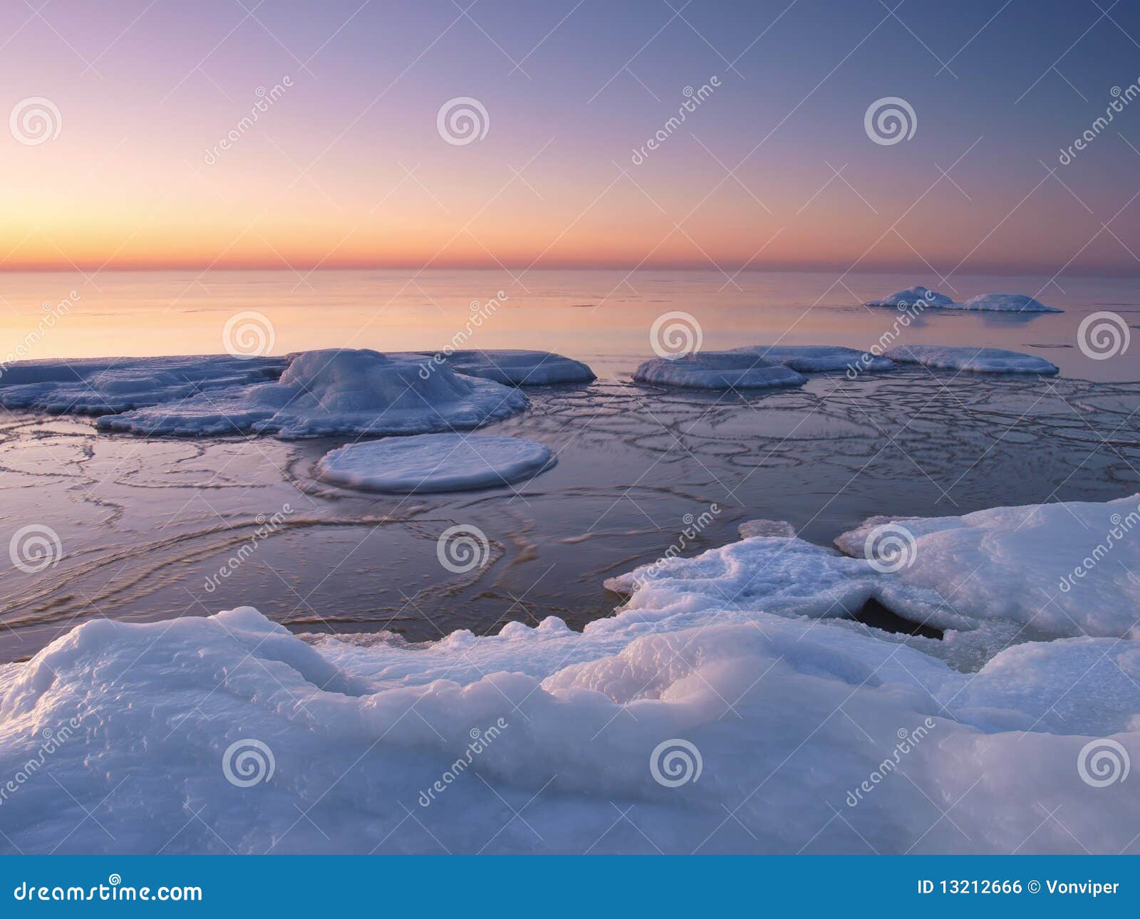 Freezing Sea Shore in the Romantic Evening Light Stock Photo - Image of ...