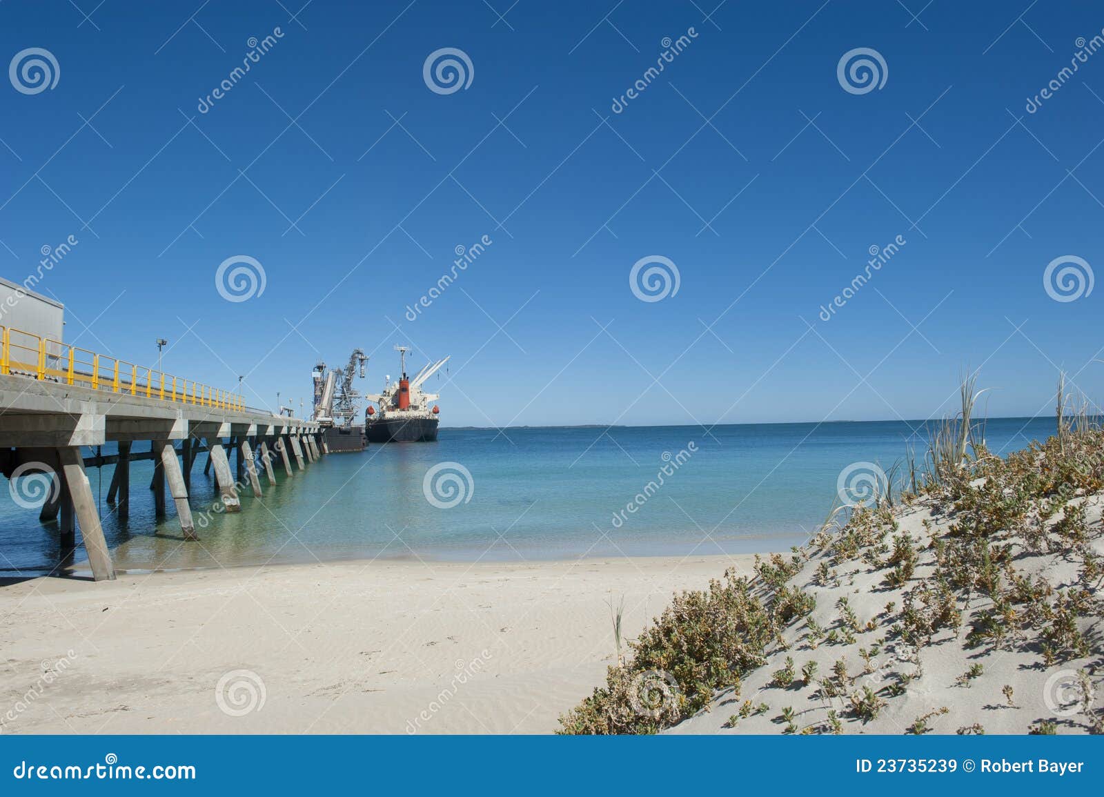Freight Ship at Pipeline Jetty Stock Image - Image of boats, horizon ...