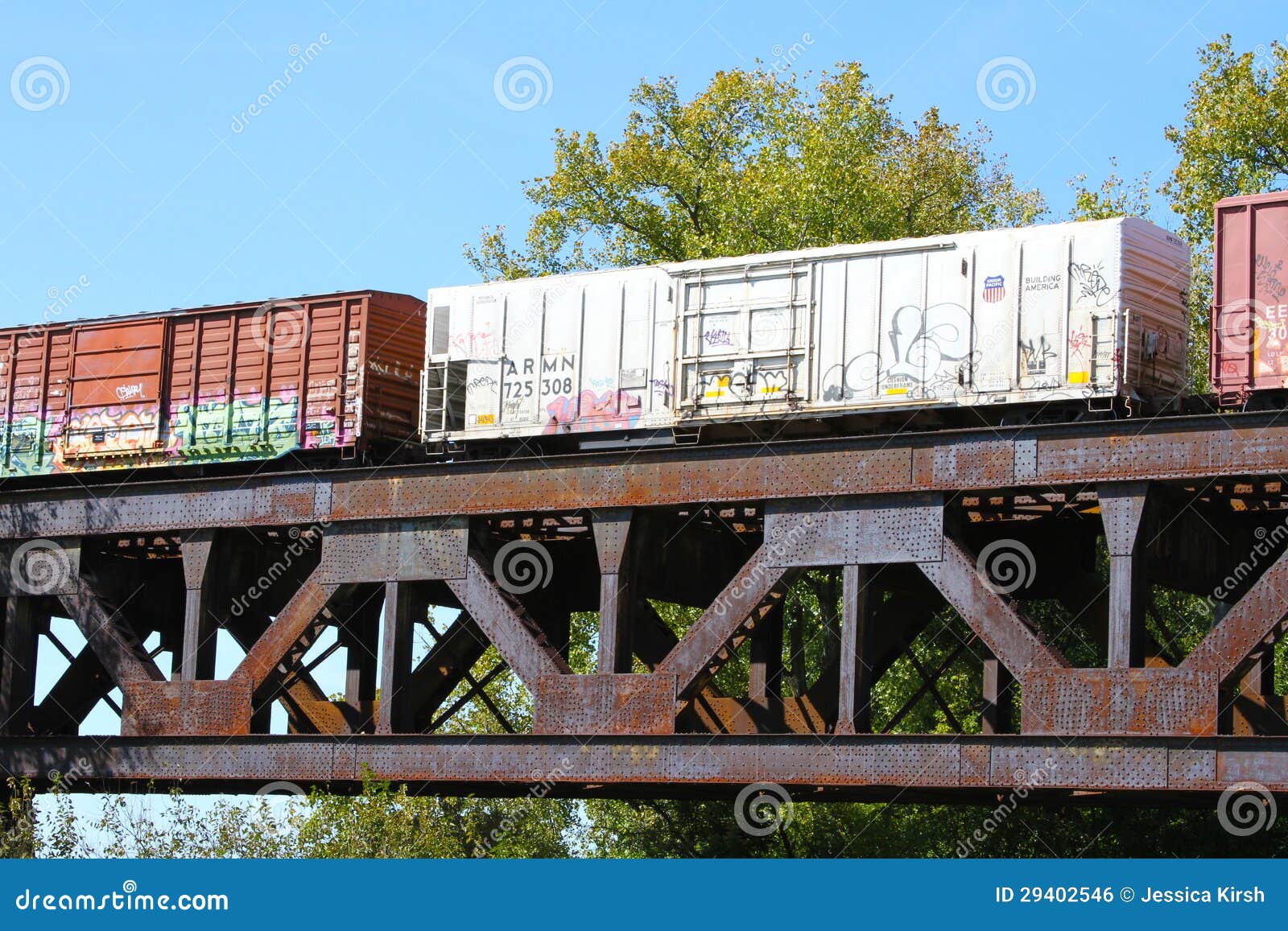 Freight Train Crossing a Steel Railroad Truss River Bridge Editorial ...