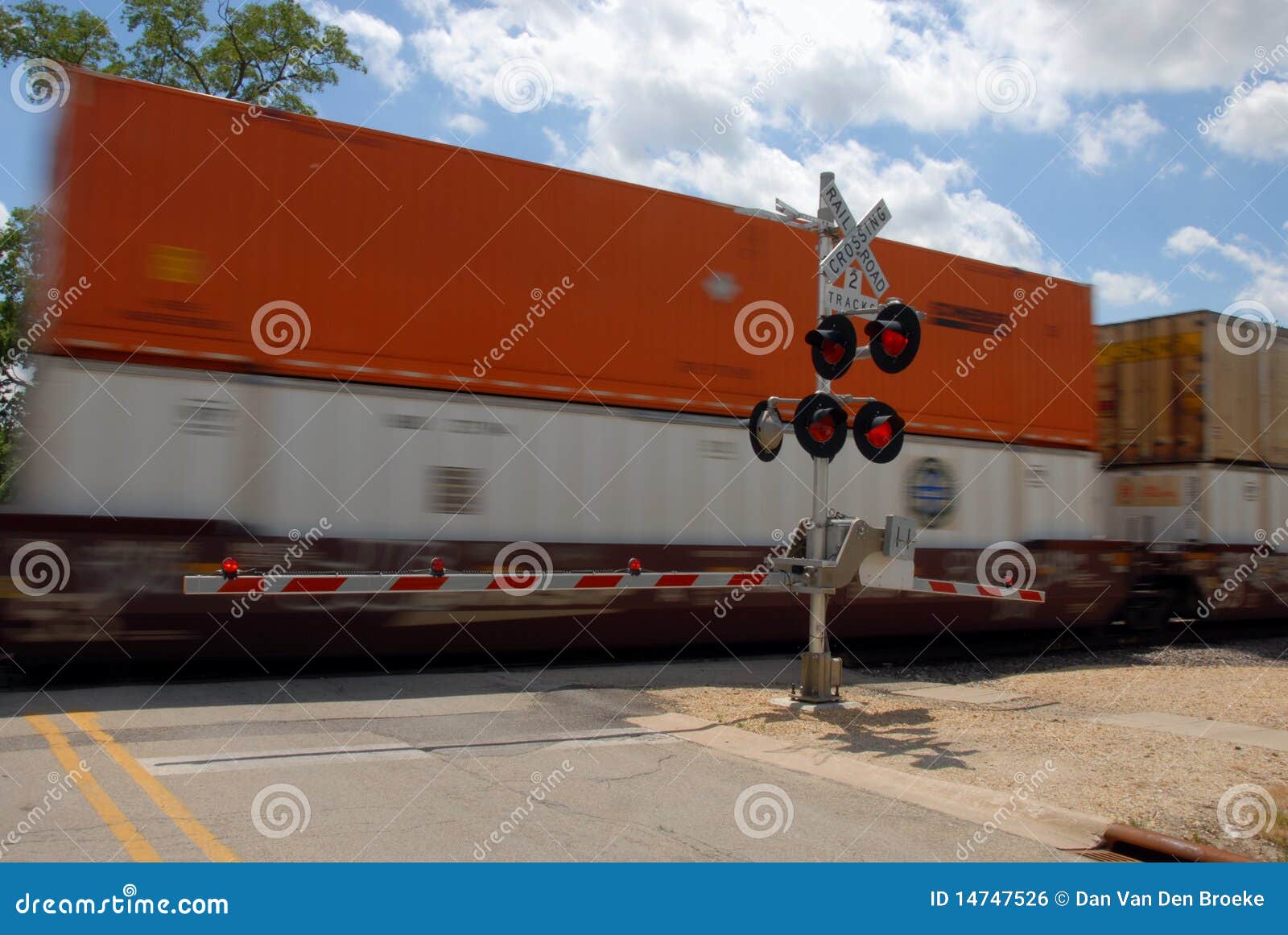 Freight Train Crossing Street Stock Photo - Image of sign, train: 14747526