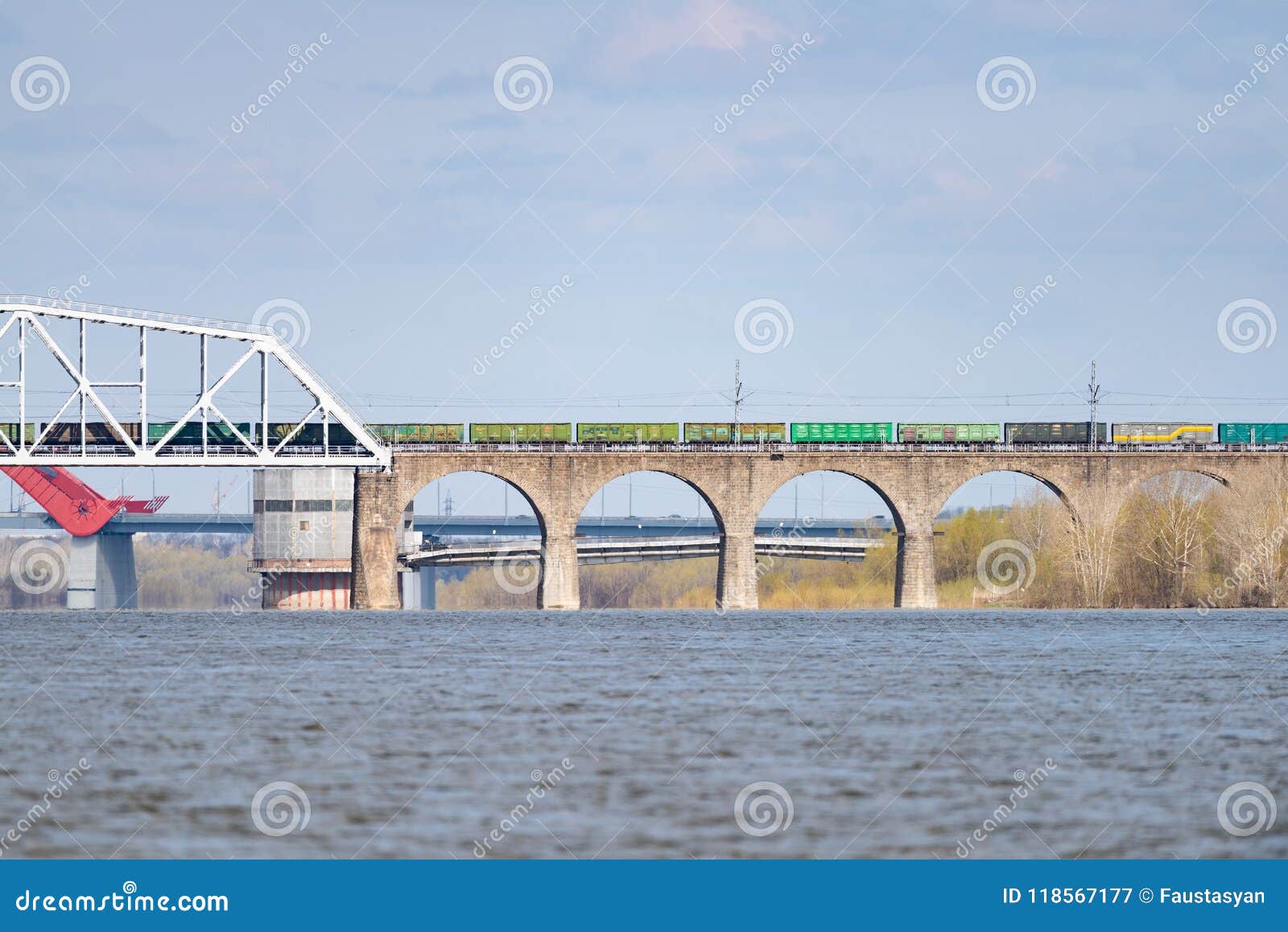 Freight Train Rides Over the Bridge Stock Image - Image of industrial ...