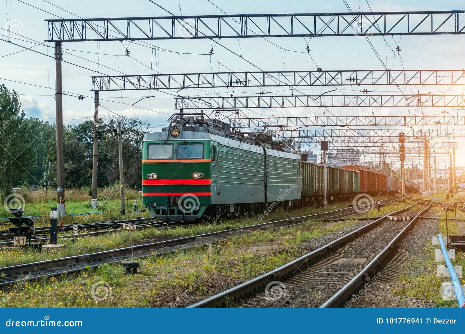 Freight Train Green with Cargo Cars on the Railway. Stock Image - Image ...