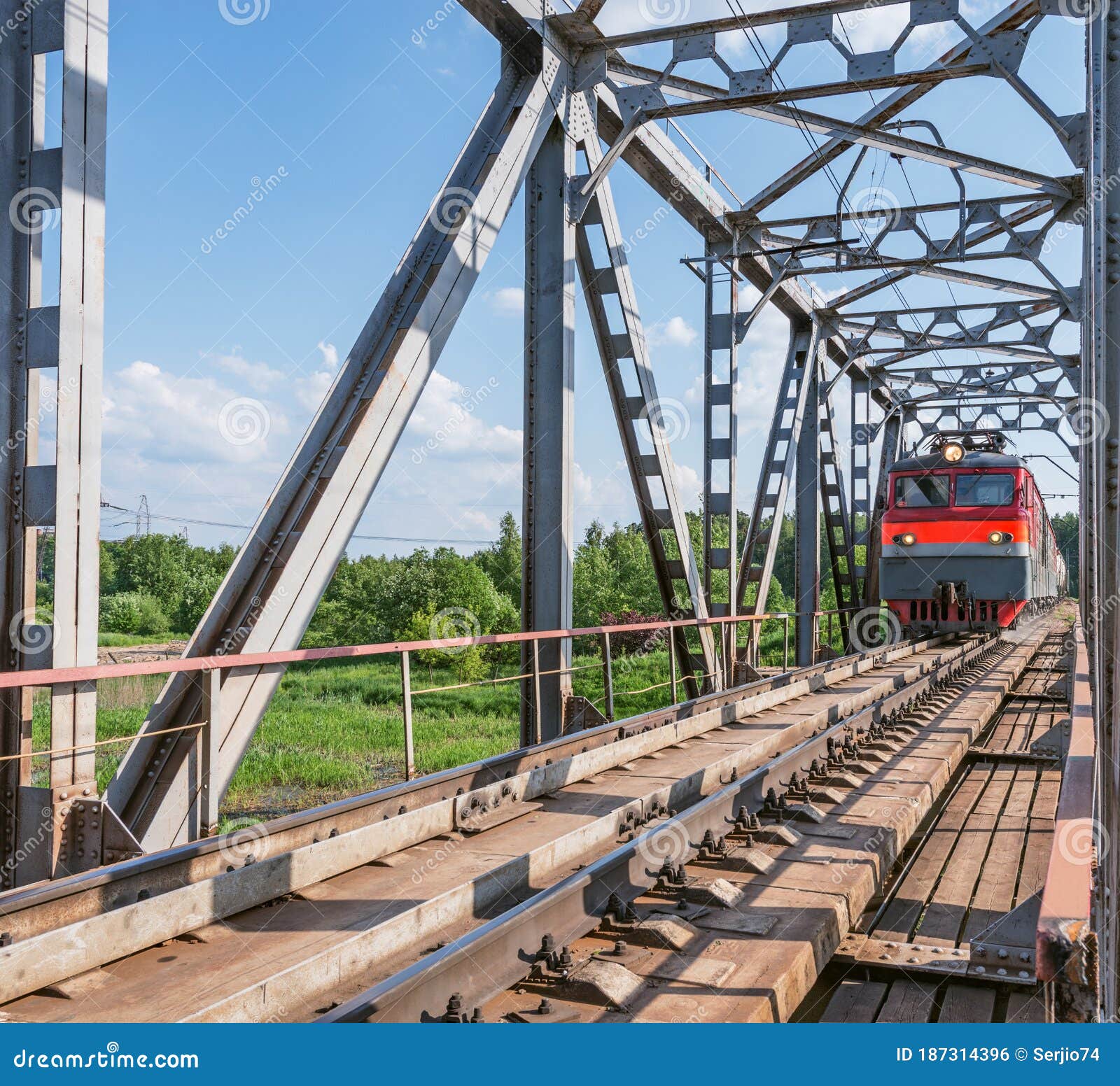 Freight Train Moves through the Bridge Stock Photo - Image of industry ...
