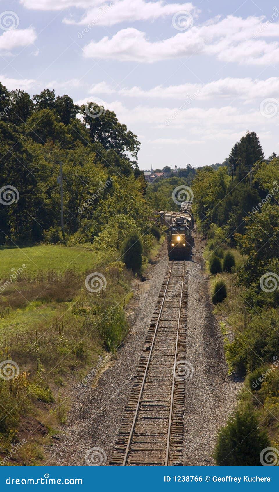 Freight Train Moves Down Track Stock Photo - Image of rail, railway ...