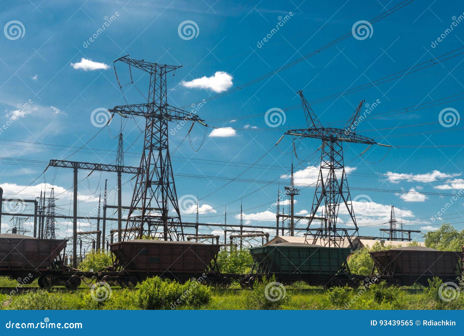 Freight Train Is Passing By Thermal Power Stations And Power Lines ...