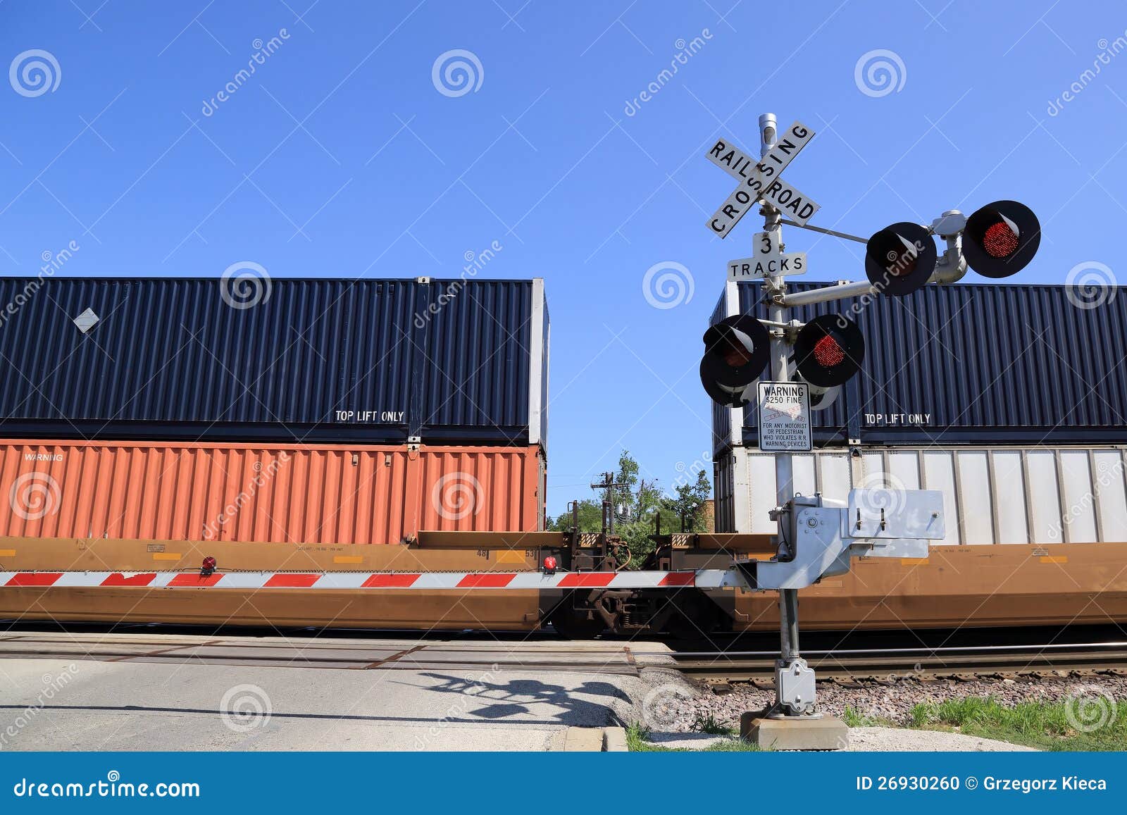 Freight Train at Railroad Crossing Stock Photo - Image of freight, rail ...