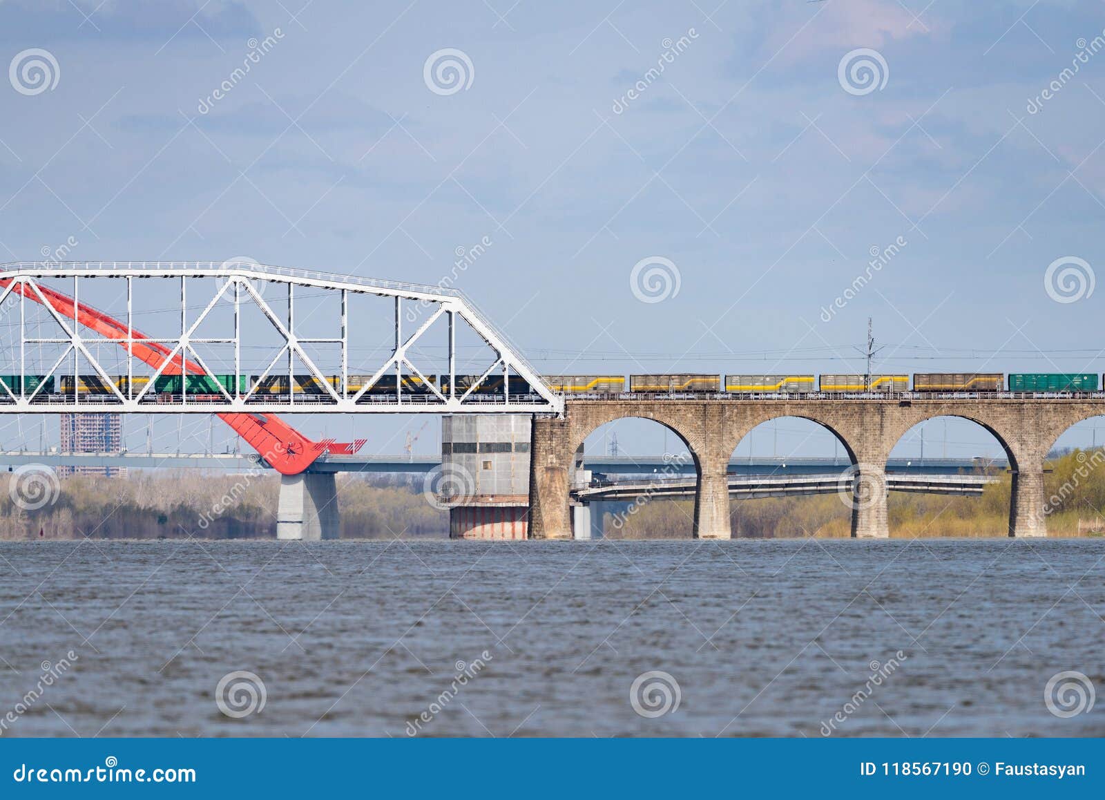 Freight Train Rides Over the Bridge Stock Photo - Image of overpass ...