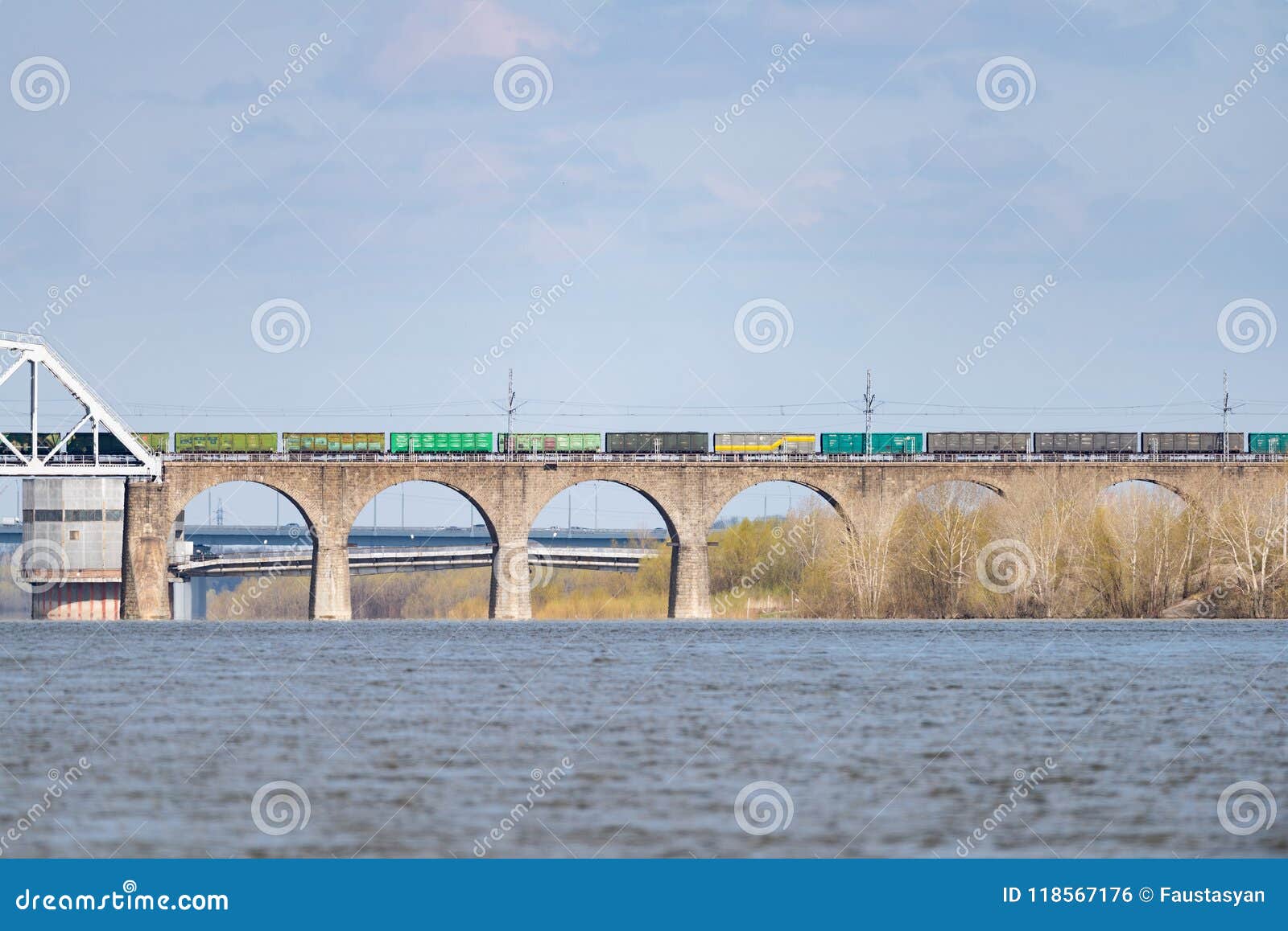 Freight Train Rides Over the Bridge Stock Photo - Image of editorial ...