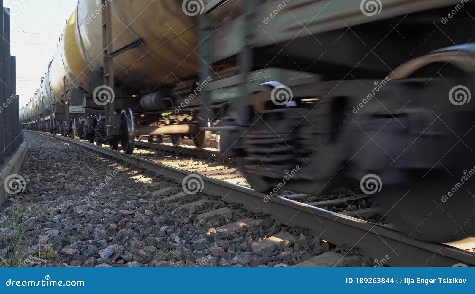 Freight Train Rides in a Sunny Day. Close-up Footage of Wheels. Stock ...