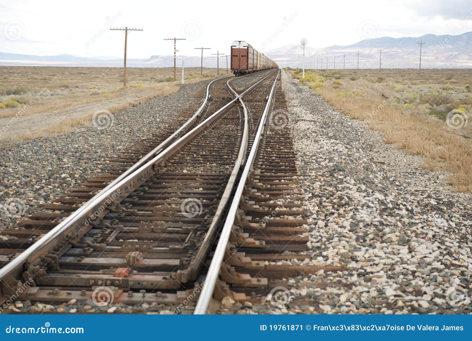 Freight Train on Tracks Crossing Desert, NV, US Stock Image - Image of ...