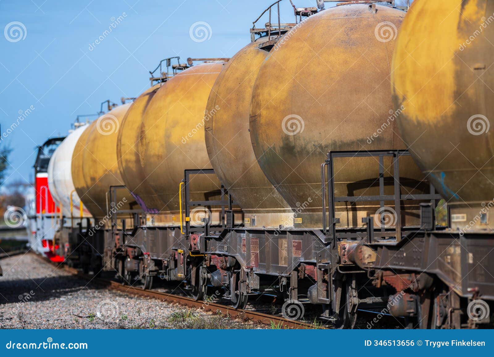 Freight Train Transporting Tanks through an Industrial Area.. Stock ...