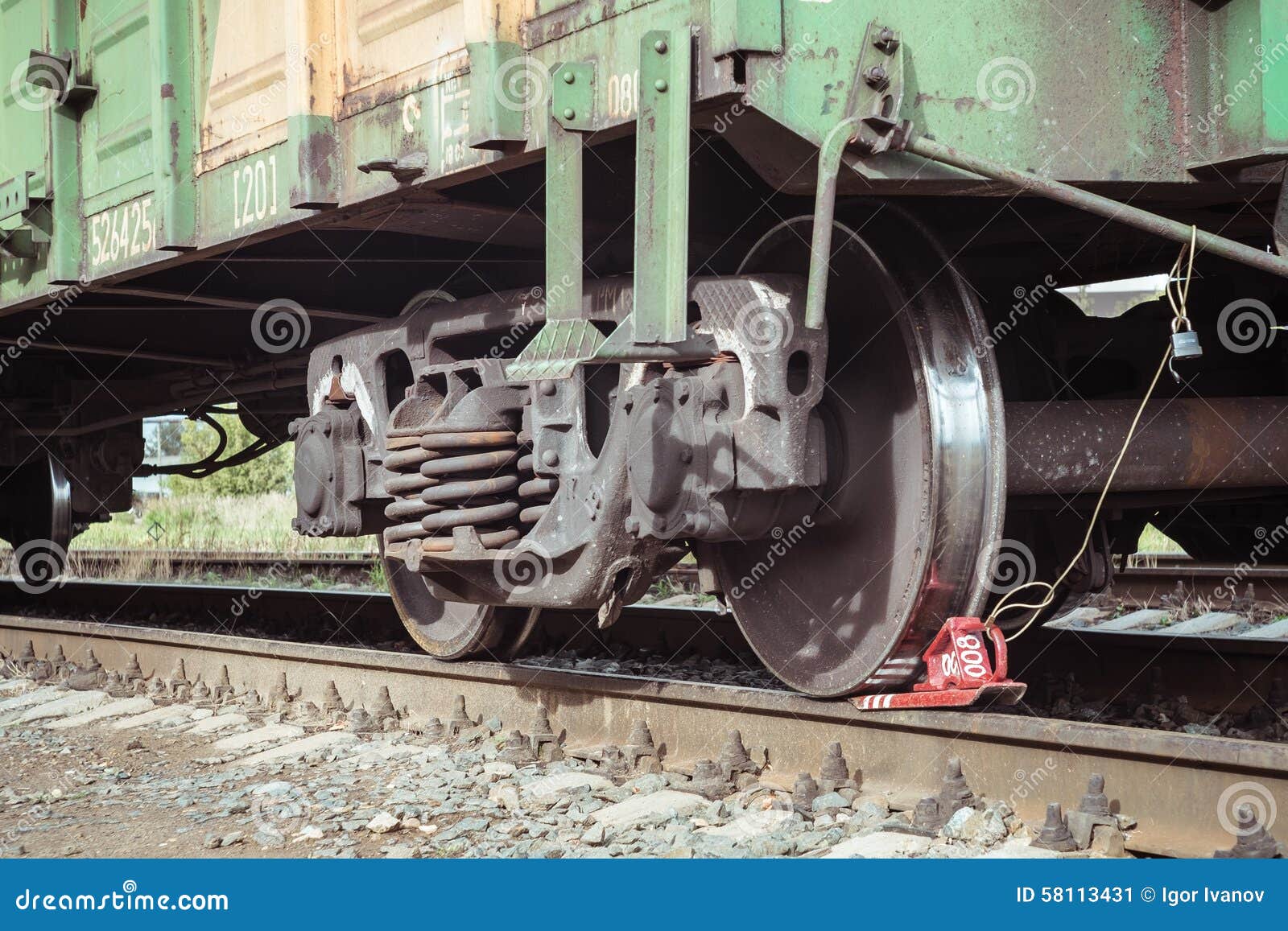 Freight Train with a Wheel Chock at the Platform Stock Image - Image of ...