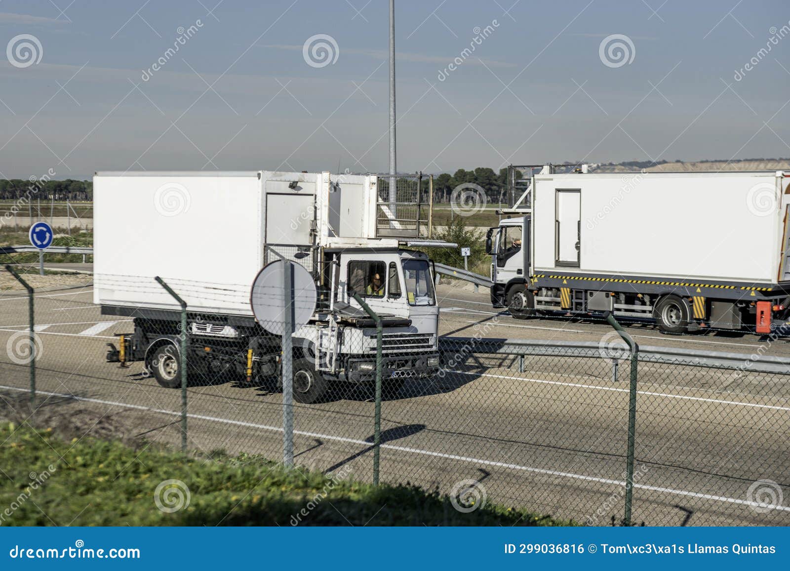 Freight Trucks Traveling on a Highway in Both Directions Stock Photo ...