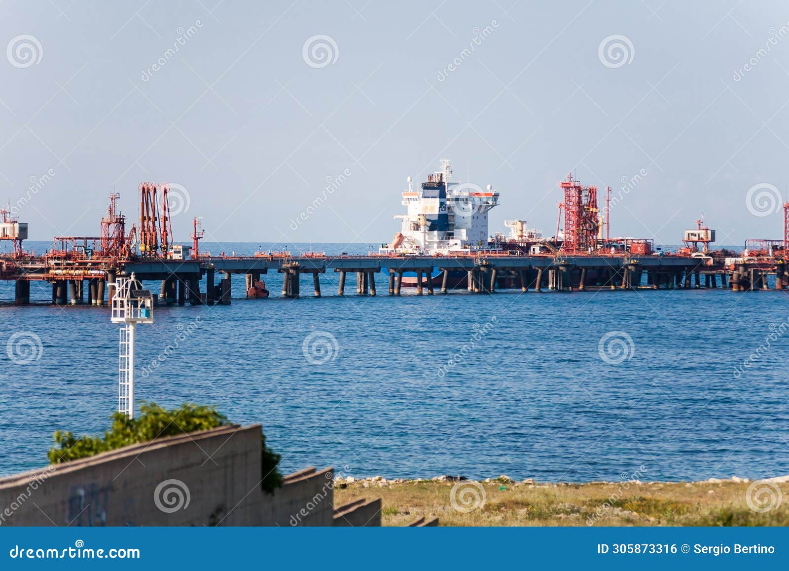 Freighter Loading or Unloading at a Wharf Stock Photo - Image of ...
