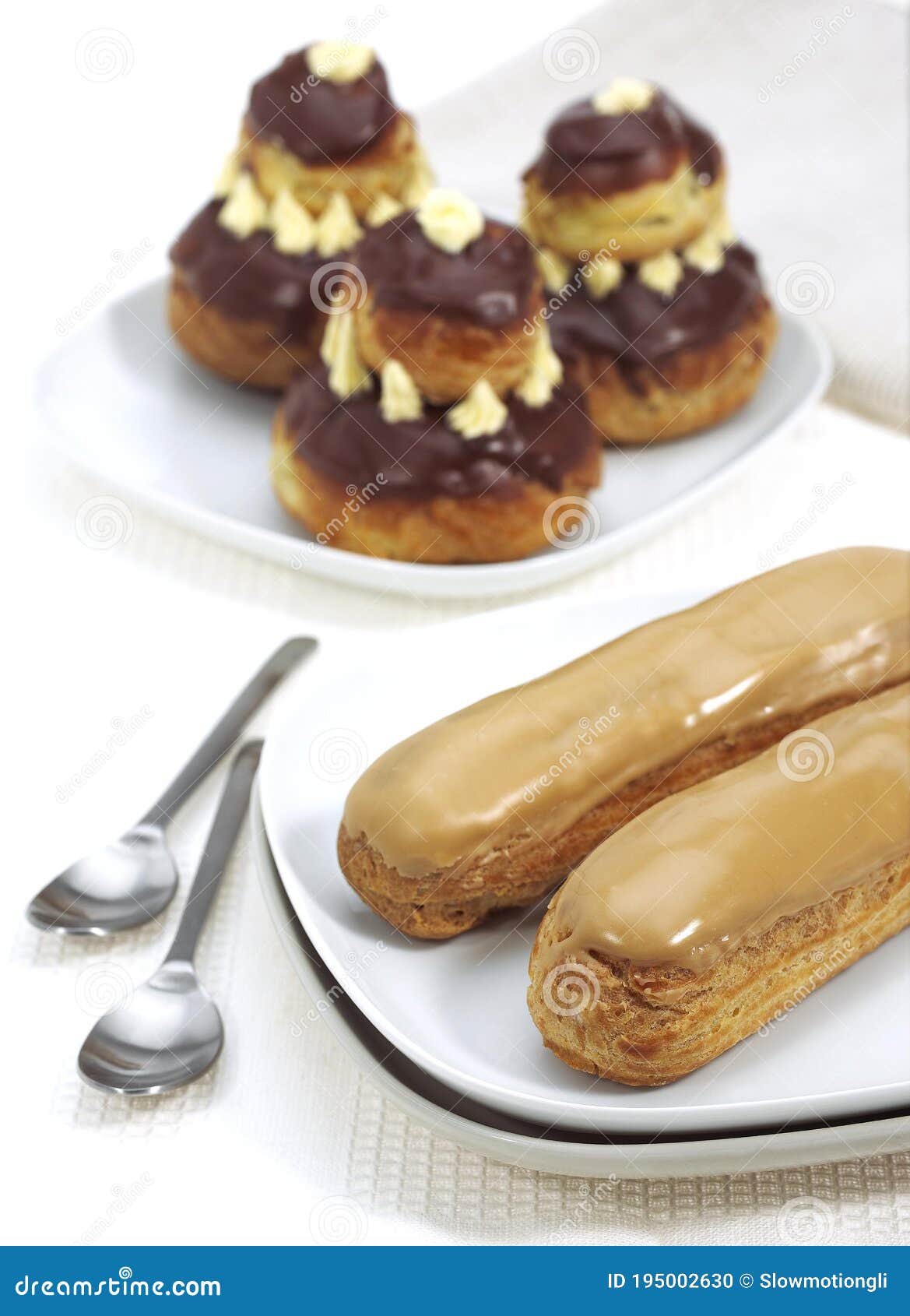 FRENCH CAKES CALLED CHOCOLATE RELIGIEUSE and COFFE ECLAIR Stock Photo ...
