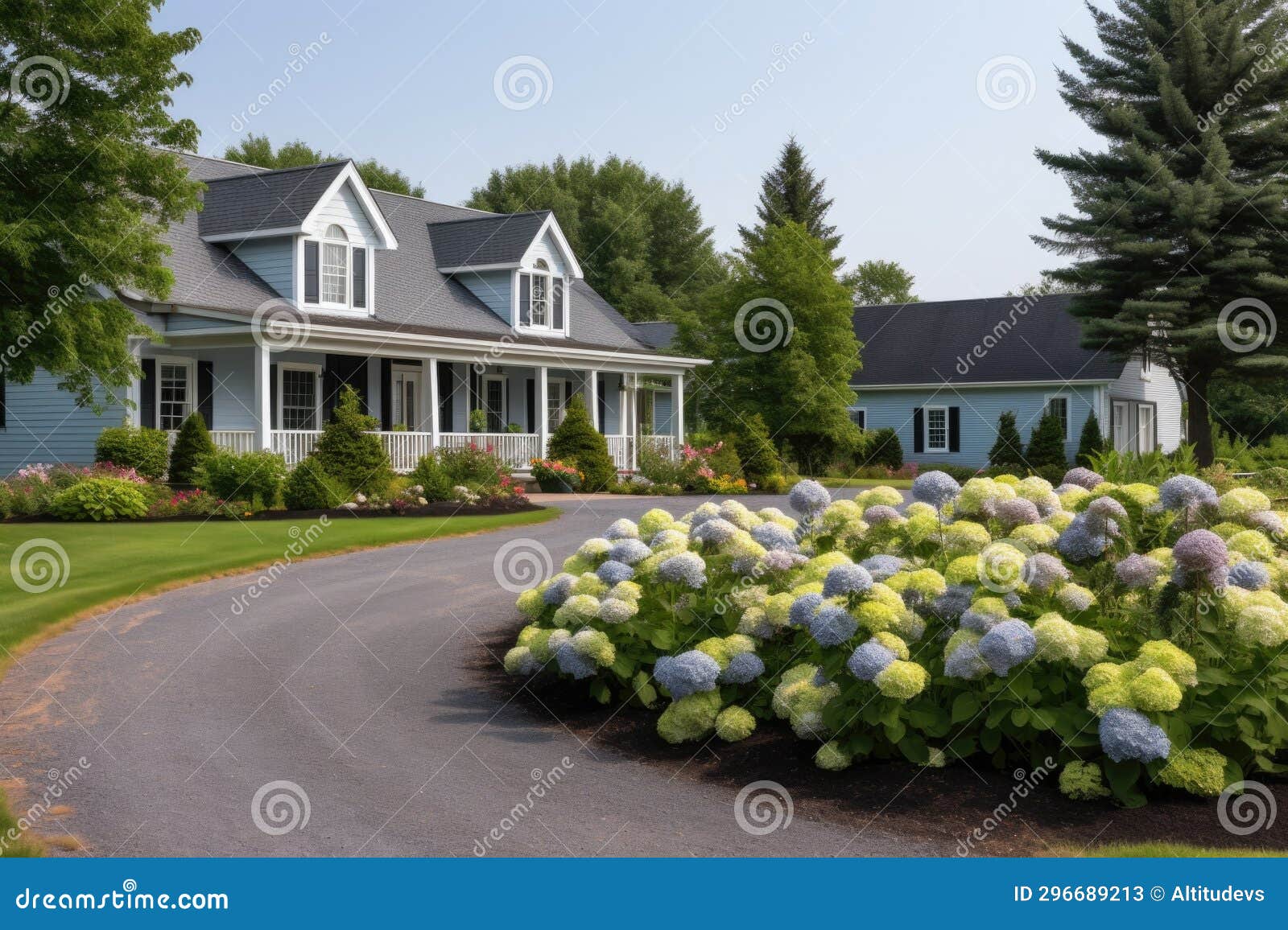 French Country House with a Half-circle Driveway Lined with Blooming ...