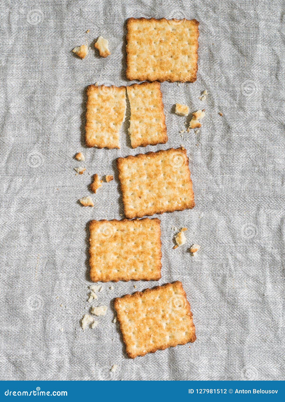 French Cracker with Sesame Seeds on a Gray Tissue Background Stock ...