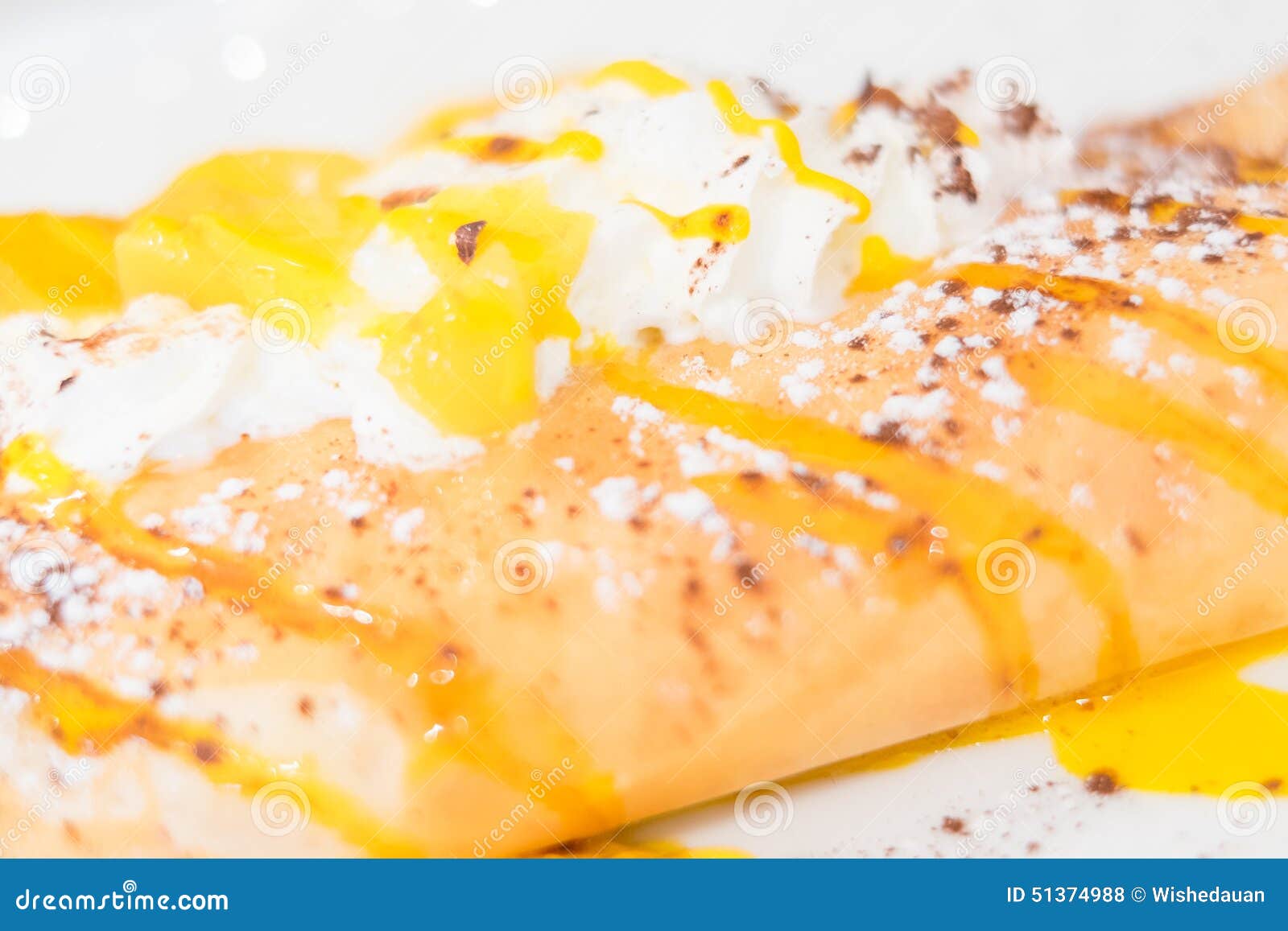 French Crepe with Mango and Cream Stock Photo - Image of orange ...