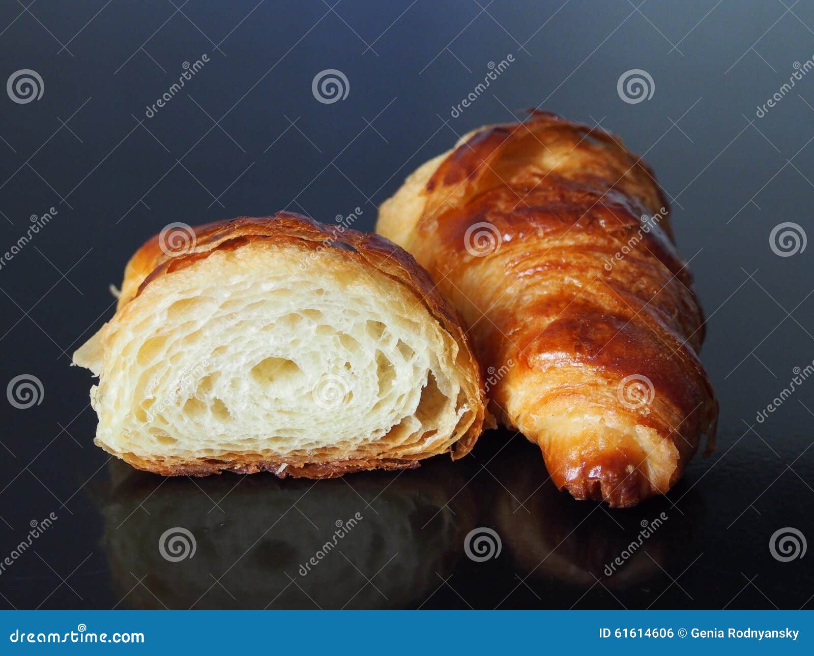 Two French Croissant Halves, Black Surface Stock Photo - Image of ...