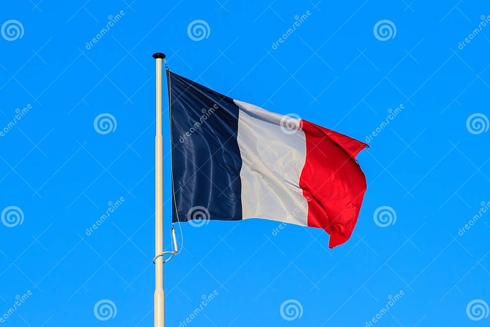 The French Flag with Blue Sky in the Background. Stock Photo - Image of ...