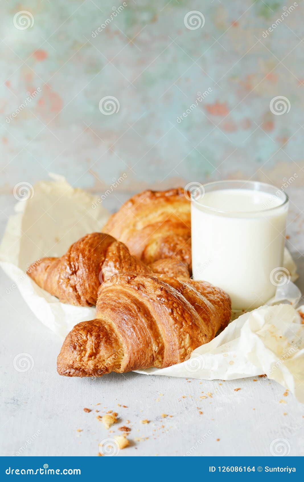 French Fresh Crispy Croissant with a Glass of Milk for Breakfast ...