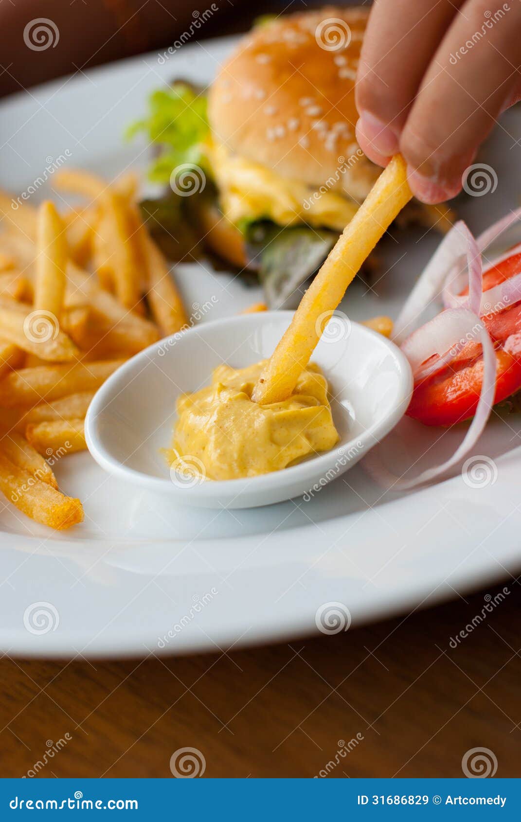 French fries dipped stock image. Image of restaurant - 31686829