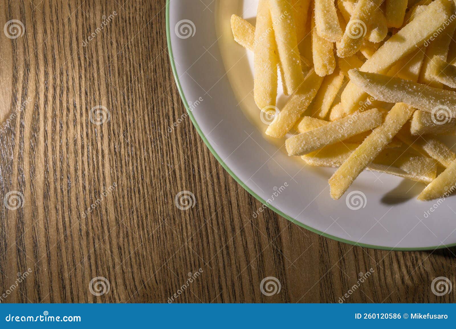 French fries on plate stock photo. Image of cooked, food - 260120586