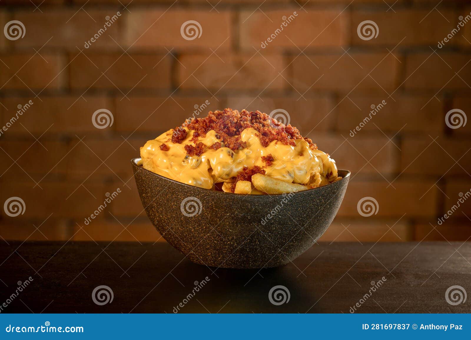 French Fries in Pot on Table in Front of Brick Wall Stock Image - Image ...