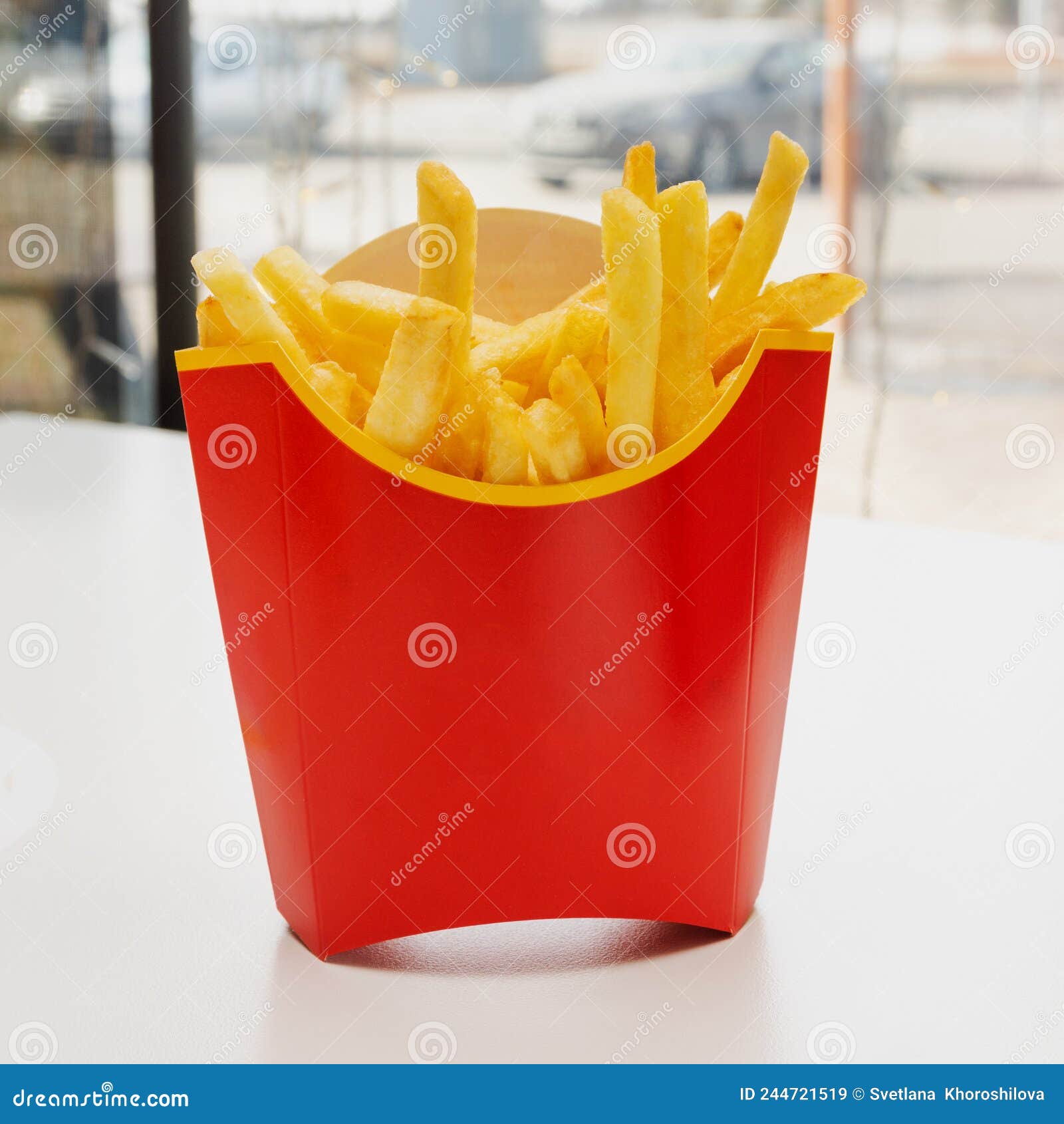 French Fries in a Red Box are on the Table in a Restaurant Stock Image ...