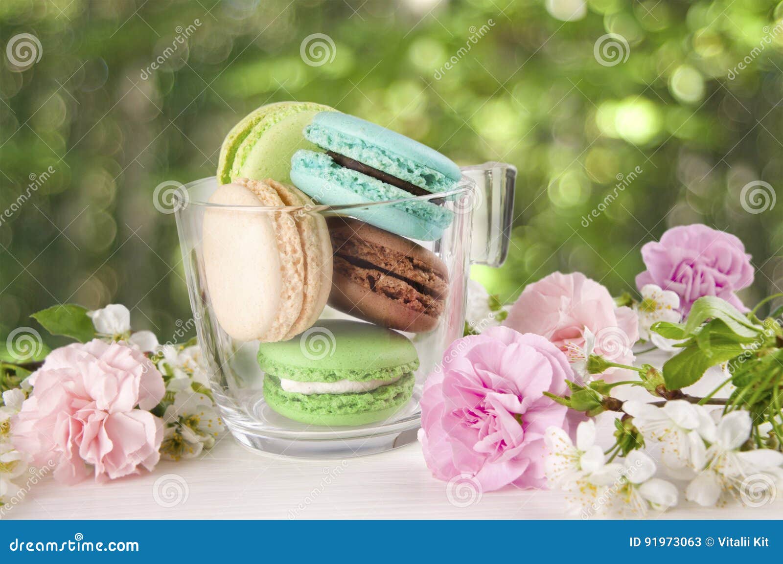 French Macaroons in Cup. Turquoise, Chocolate and Green Macaroon Stock ...