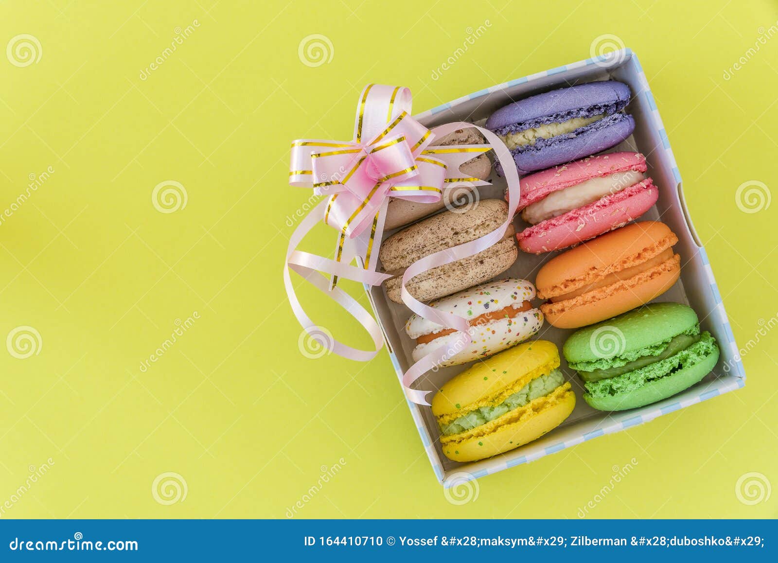 French Multi-colored Cookies Makoorons on a Yellow Background Stock ...
