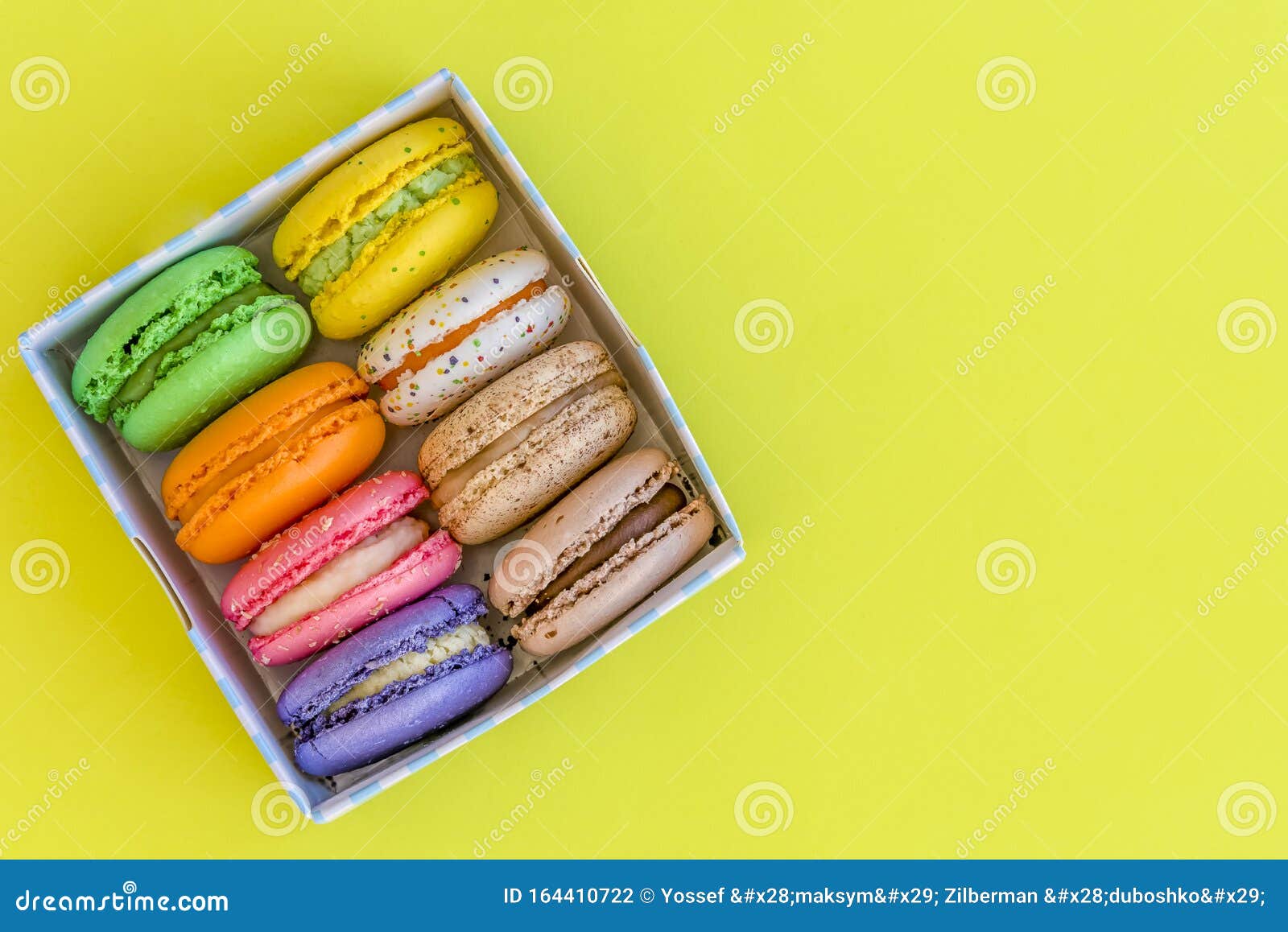 French Multi-colored Cookies Makoorons on a Yellow Background Stock ...