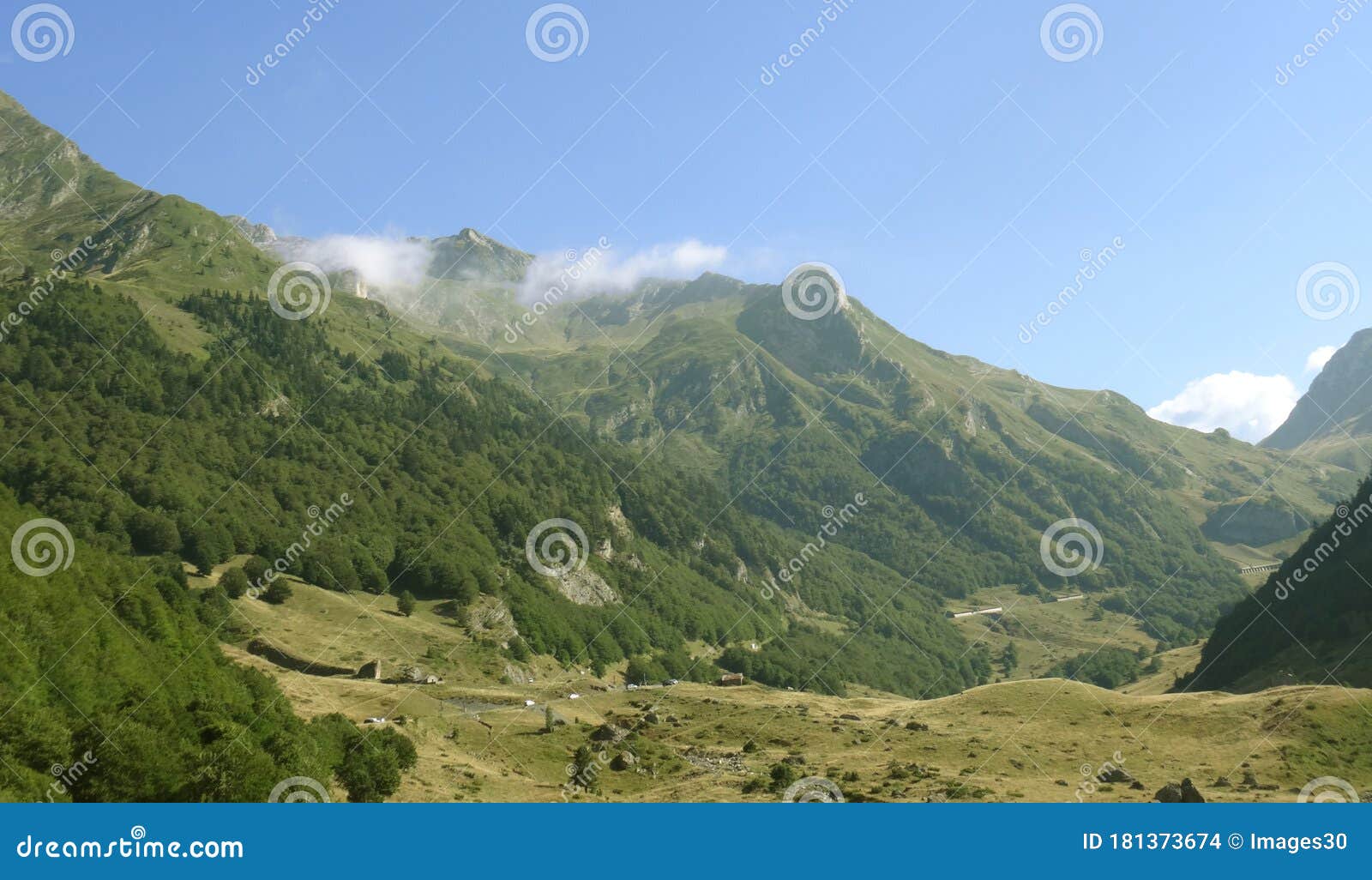 French Pyrenees in the Morning Sun with Clouds Rising in the Background ...