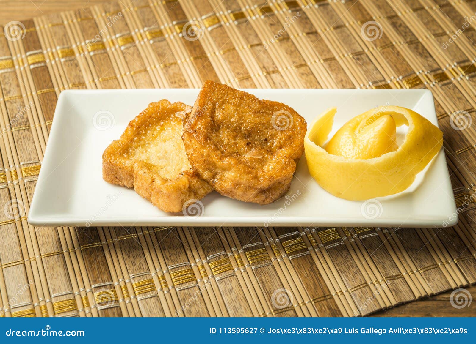 French Toast in a Rectangular Dish on a Bamboo Mat Stock Image - Image ...