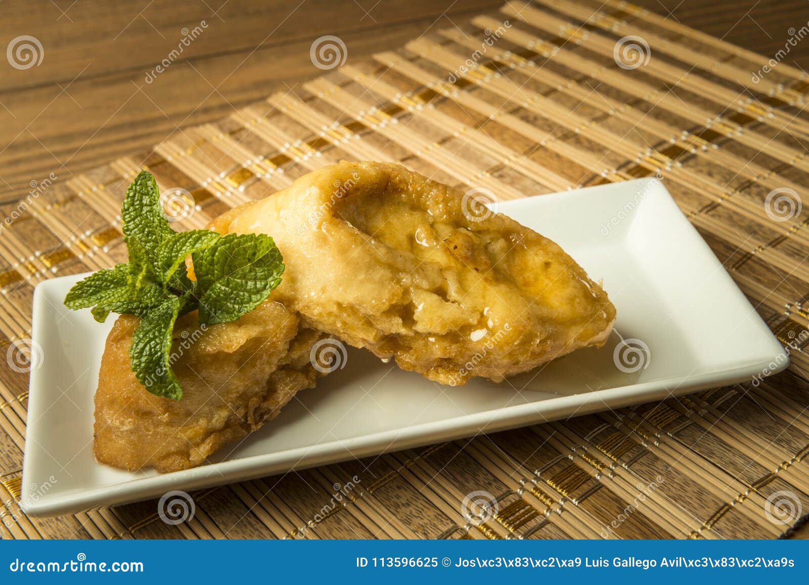 French Toast in a Rectangular Dish on a Bamboo Mat Stock Image - Image ...