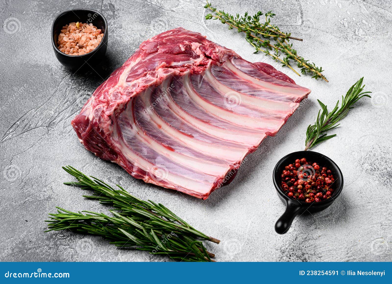 Raw Rack Of Mutton Lamb Ribs On Butcher Board. Isolated On White ...
